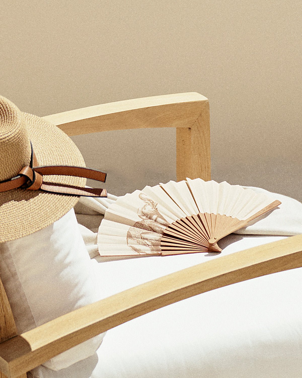 Wood and fabric folding fan